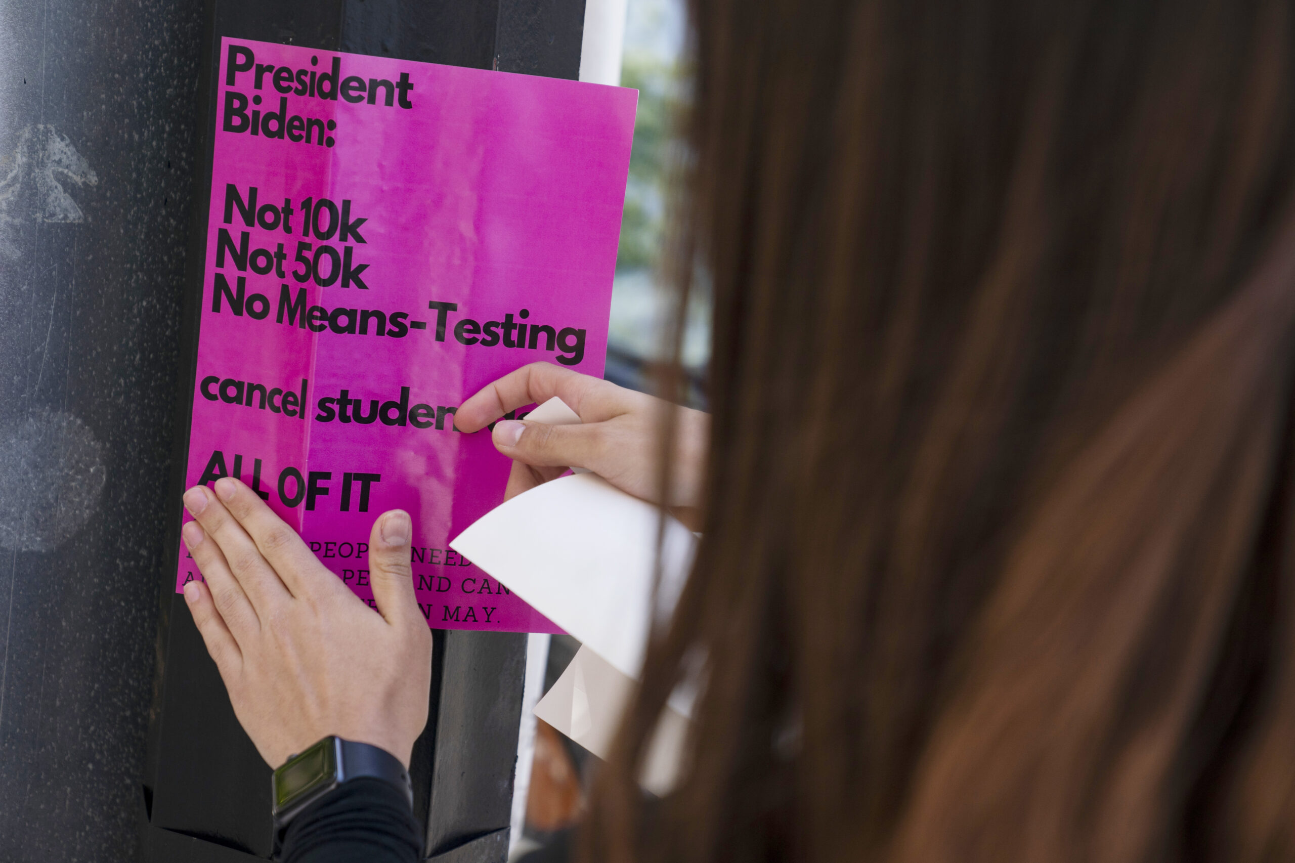 Biden order hailed as step toward total student loan debt cancellation ...