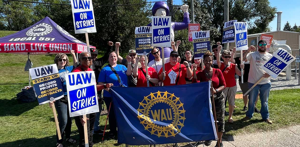 Record national strike wave swells as 300,000 hit the picket lines ...