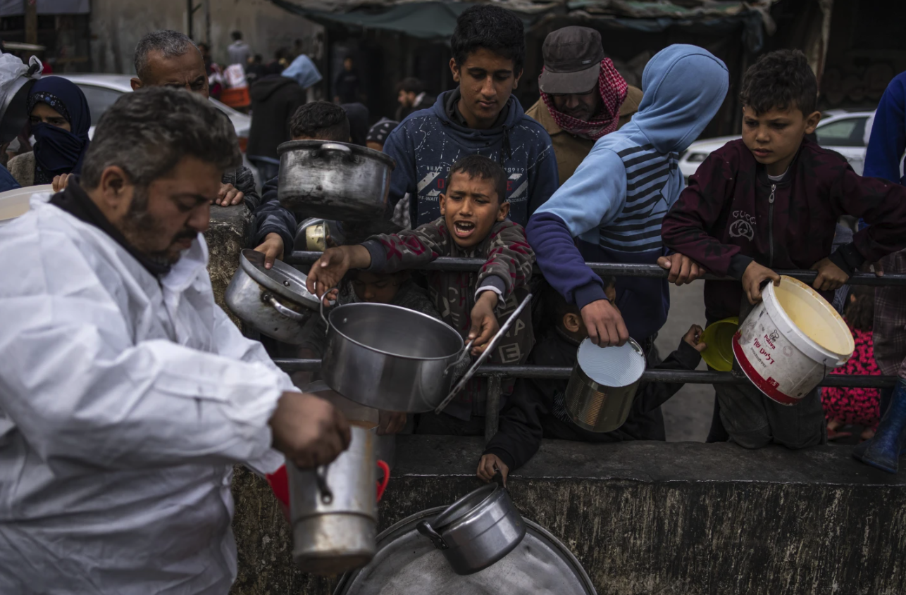 Gaza City massacre: Israel guns down starving Palestinians begging for ...